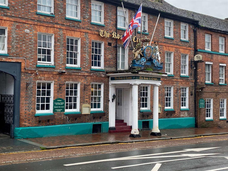Historic entrance of Tonbridge High Street’s Rose and Crown Hotel poses ...