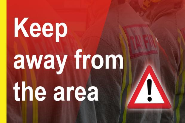 Emergency services at scene of building fire on Llandudno promenade
