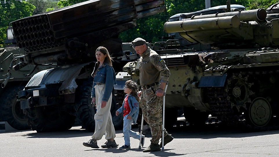 Ukraine strikes deep as Russia scales back parade