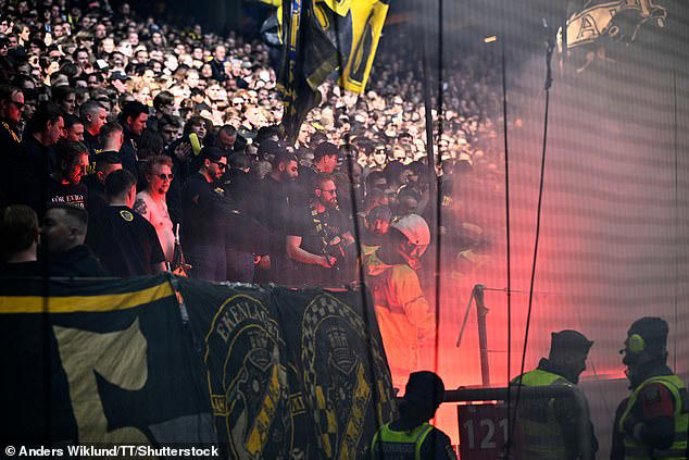 Fire breaks out next to fans at 50,000-seater football stadium during ...