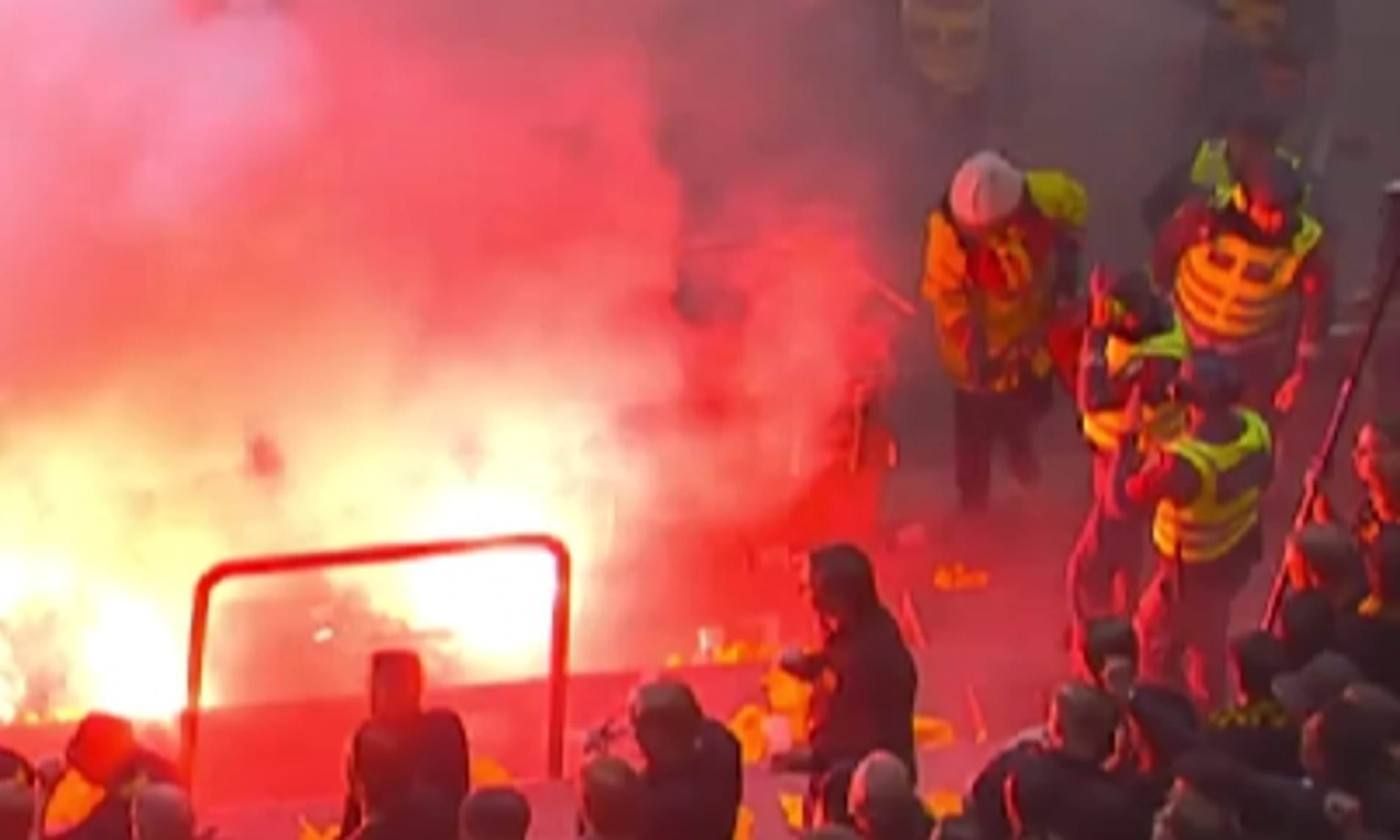 Fire breaks out next to fans at 50,000-seater football stadium during ...