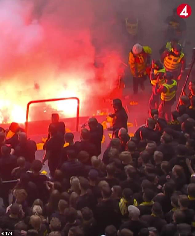 Fire breaks out next to fans at 50,000-seater football stadium during ...
