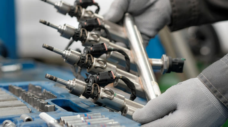 What parts of the engine are the most prone to carbon buildup?