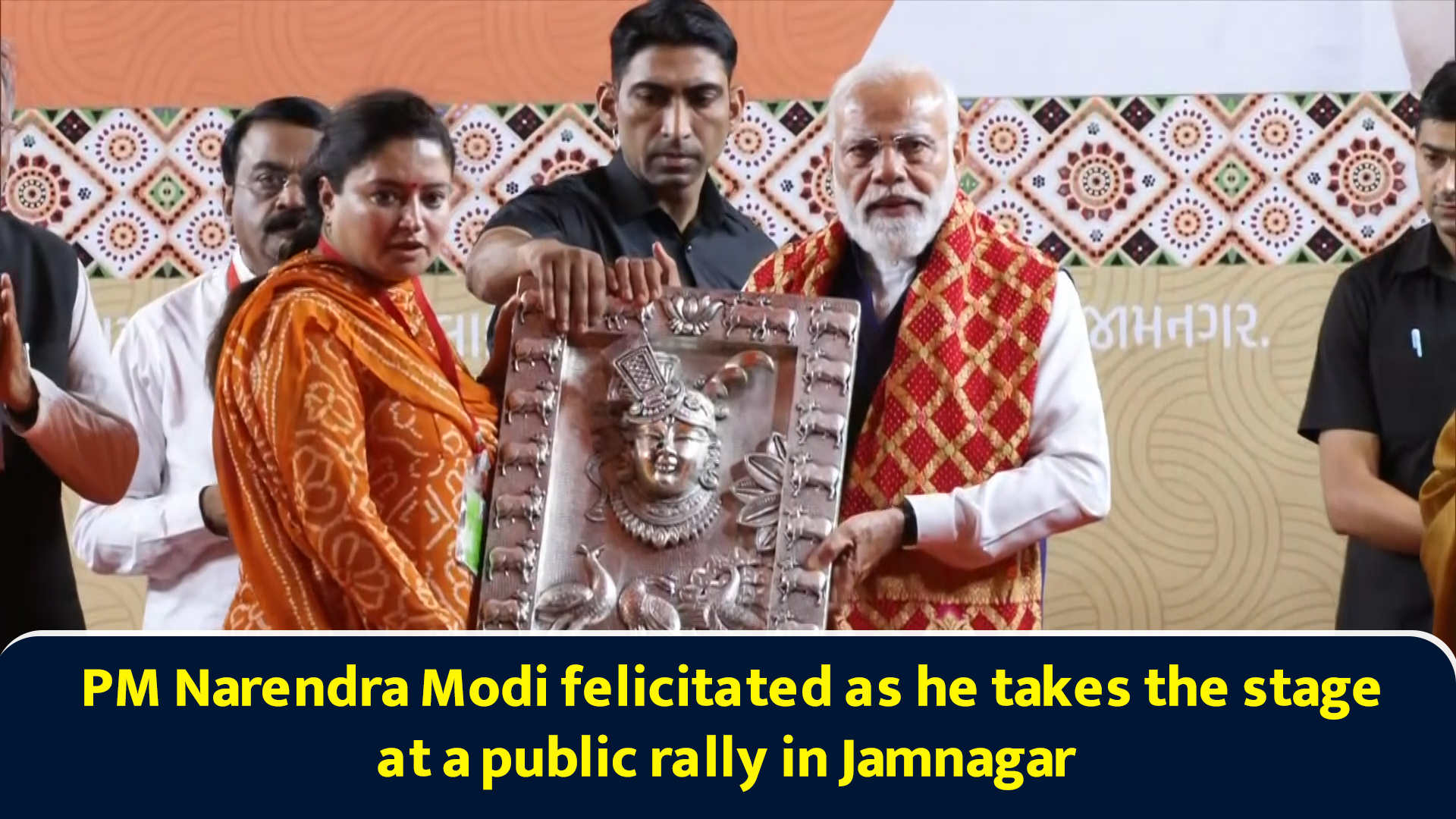 PM Narendra Modi felicitated as he takes the stage at a public rally in ...
