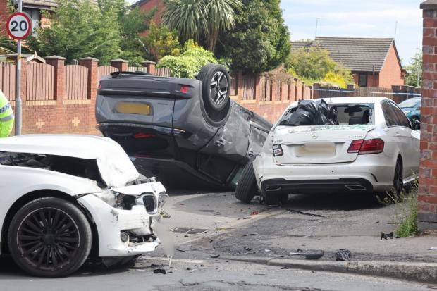 Children among those injured in 3-car crash in which vehicle flipped ...