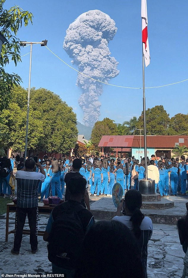 Bodies of two tourists are found holding each other days after volcano ...