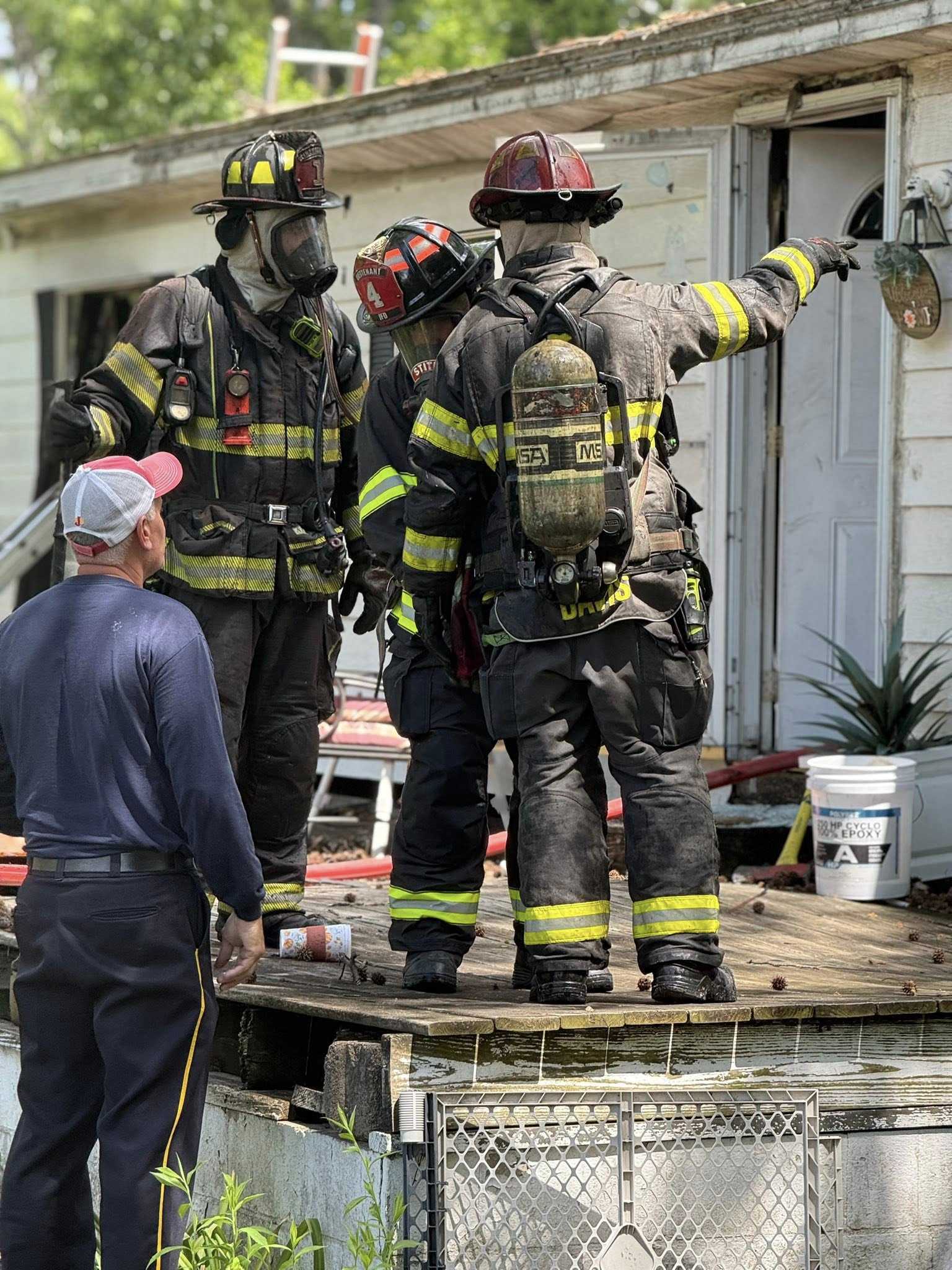 Dog rescued from house fire in Jeffersonville; cause under investigation