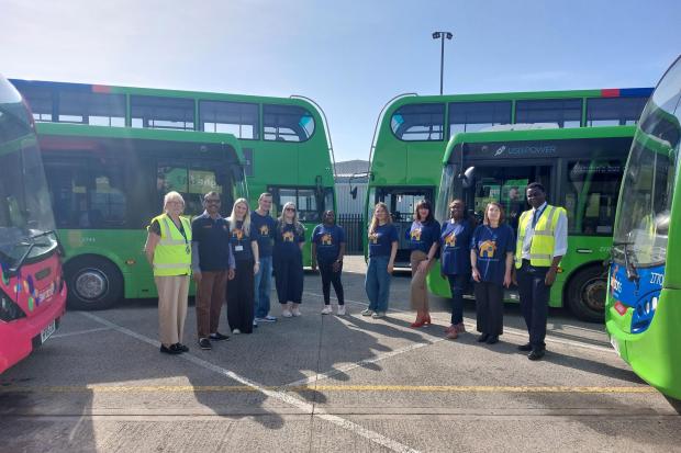 Six buses lined up in Swindon to represent children in need of homes