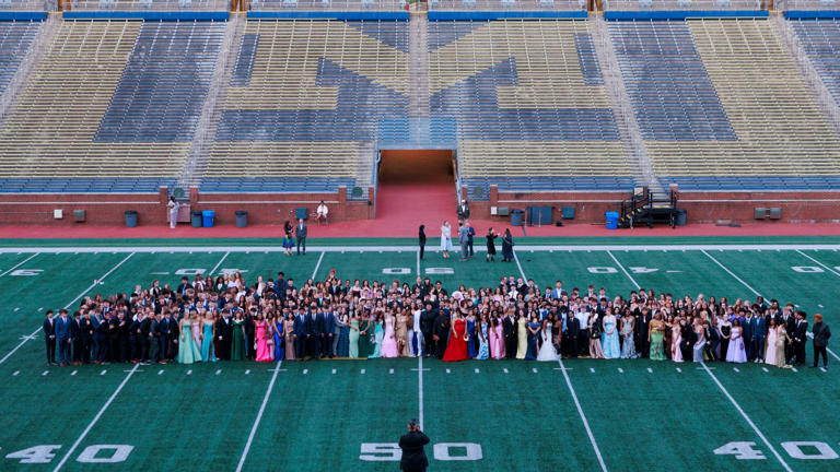 Our favorite photos from Ann Arbor Pioneer's prom at Michigan Stadium