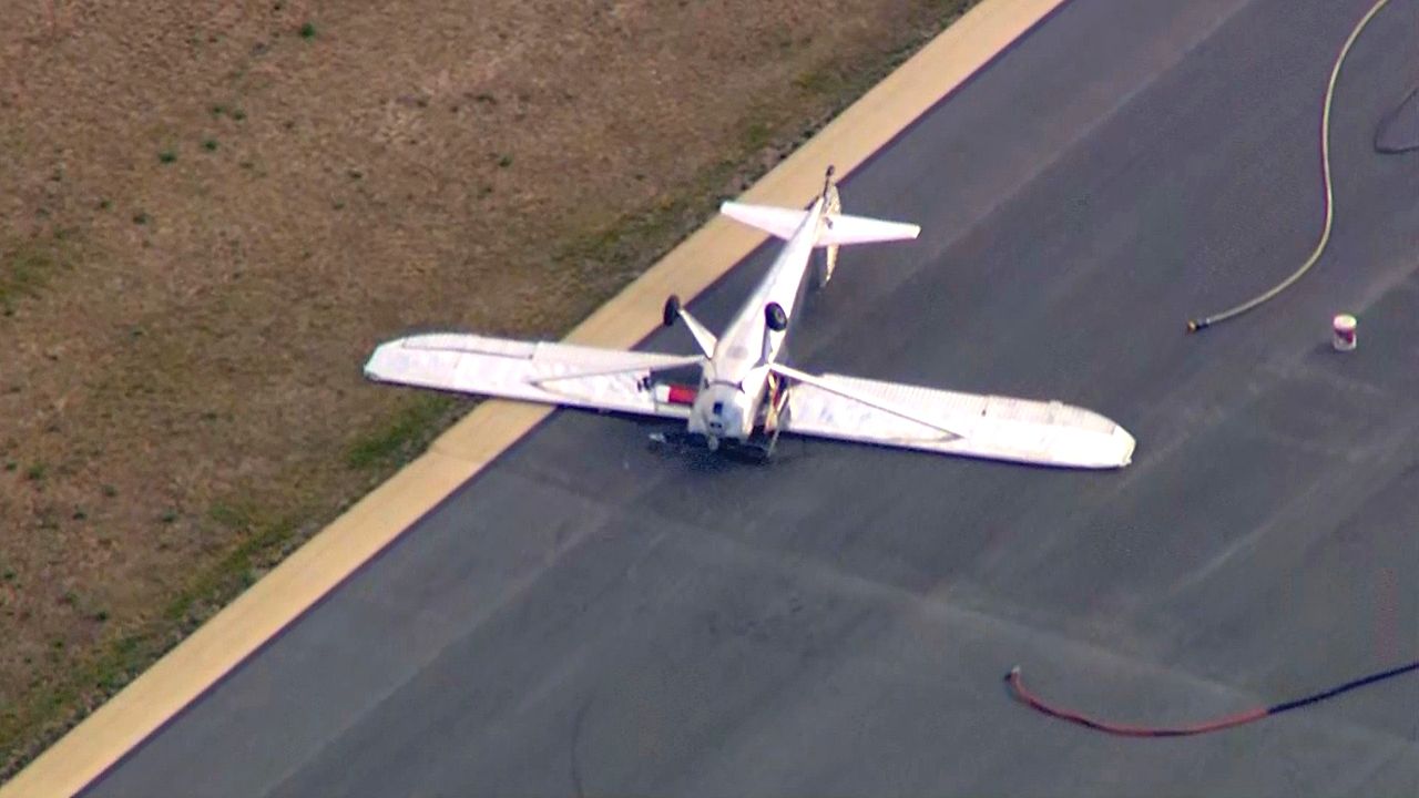 Small plane flips onto its roof on landing at Cape Cod airport in ...