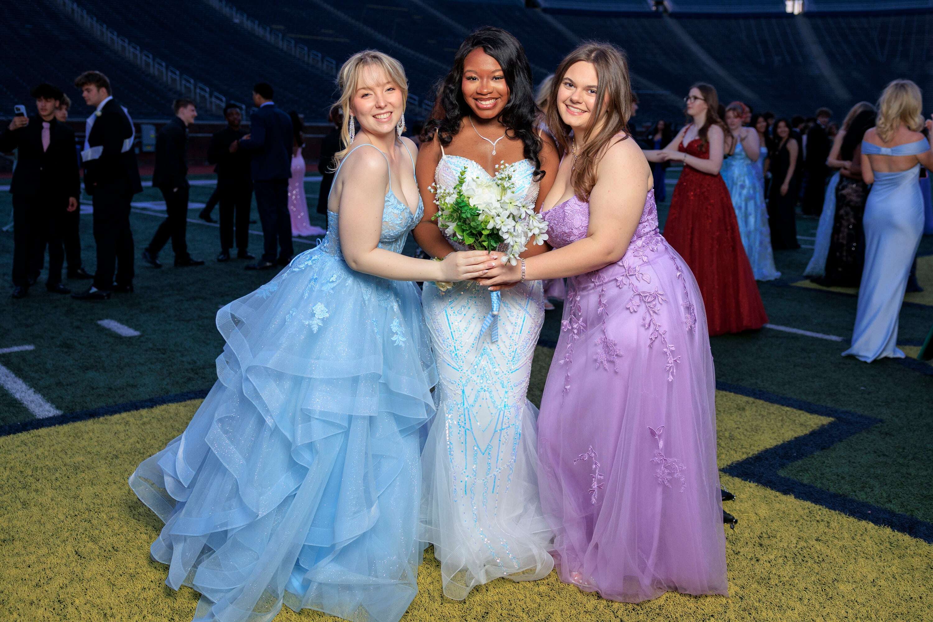 Our favorite photos from Ann Arbor Pioneer's prom at Michigan Stadium