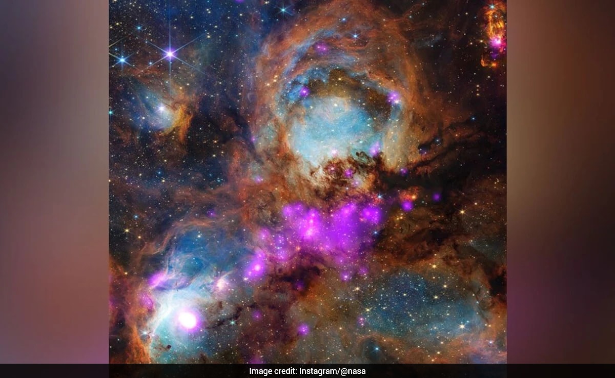 Cosmic collab of two space telescopes shows Cat's Paw Nebula in ...