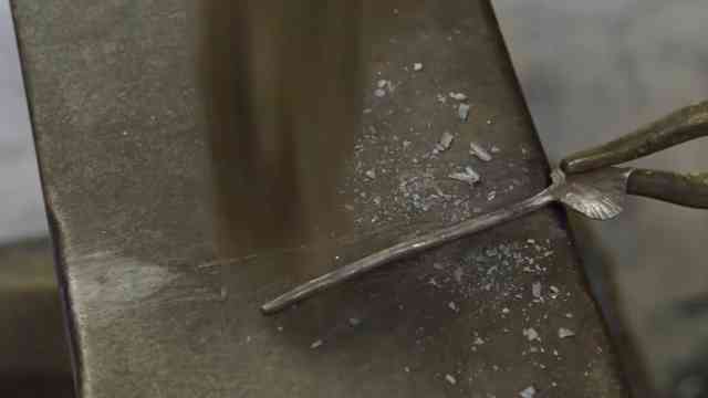 Turning steel into a leaf key ring