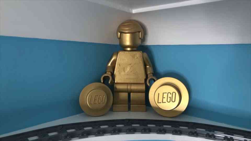 A LEGO train runs around the ceiling