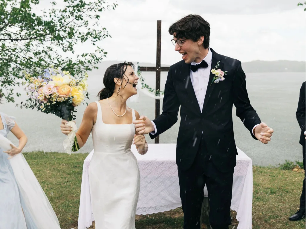 Couple’s wedding ceremony was hit by rain – then they ran straight into ...