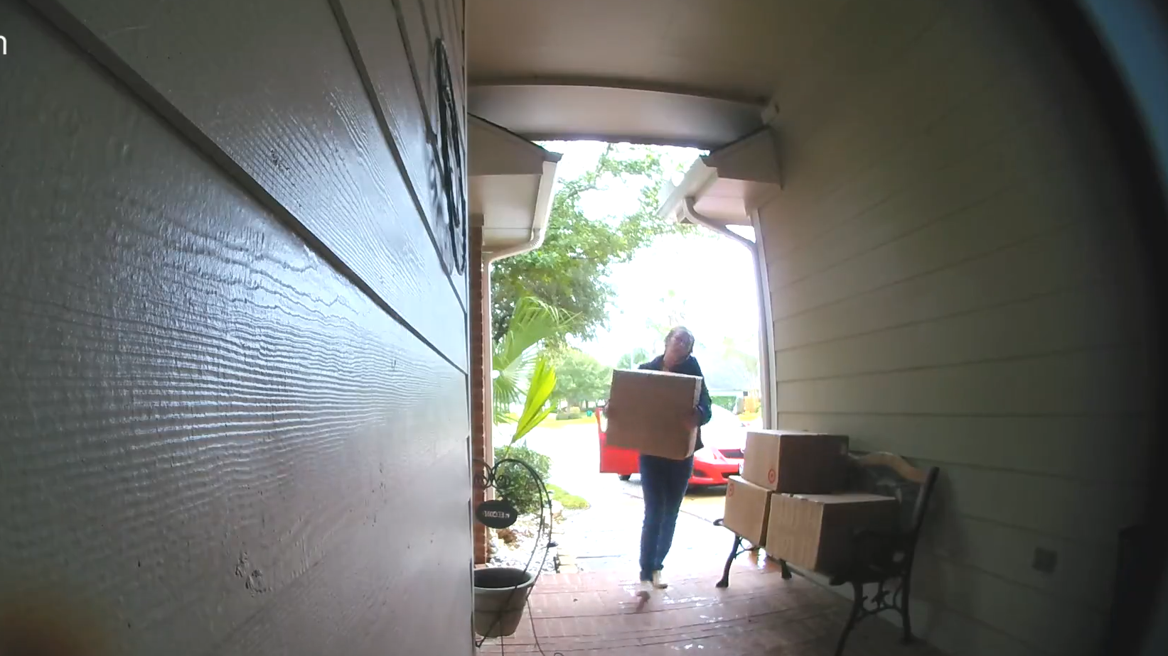 Woman caught red-handed stealing packages at doorstep