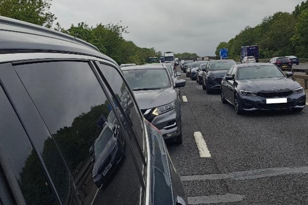 Five cars and lorry in crash blocking M1 at Watford - driver hospitalised