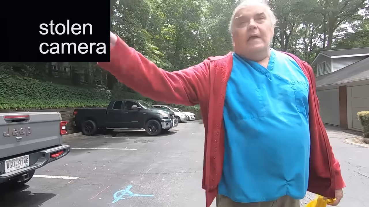 Paranoid man loses it as his car gets towed - caught on camera