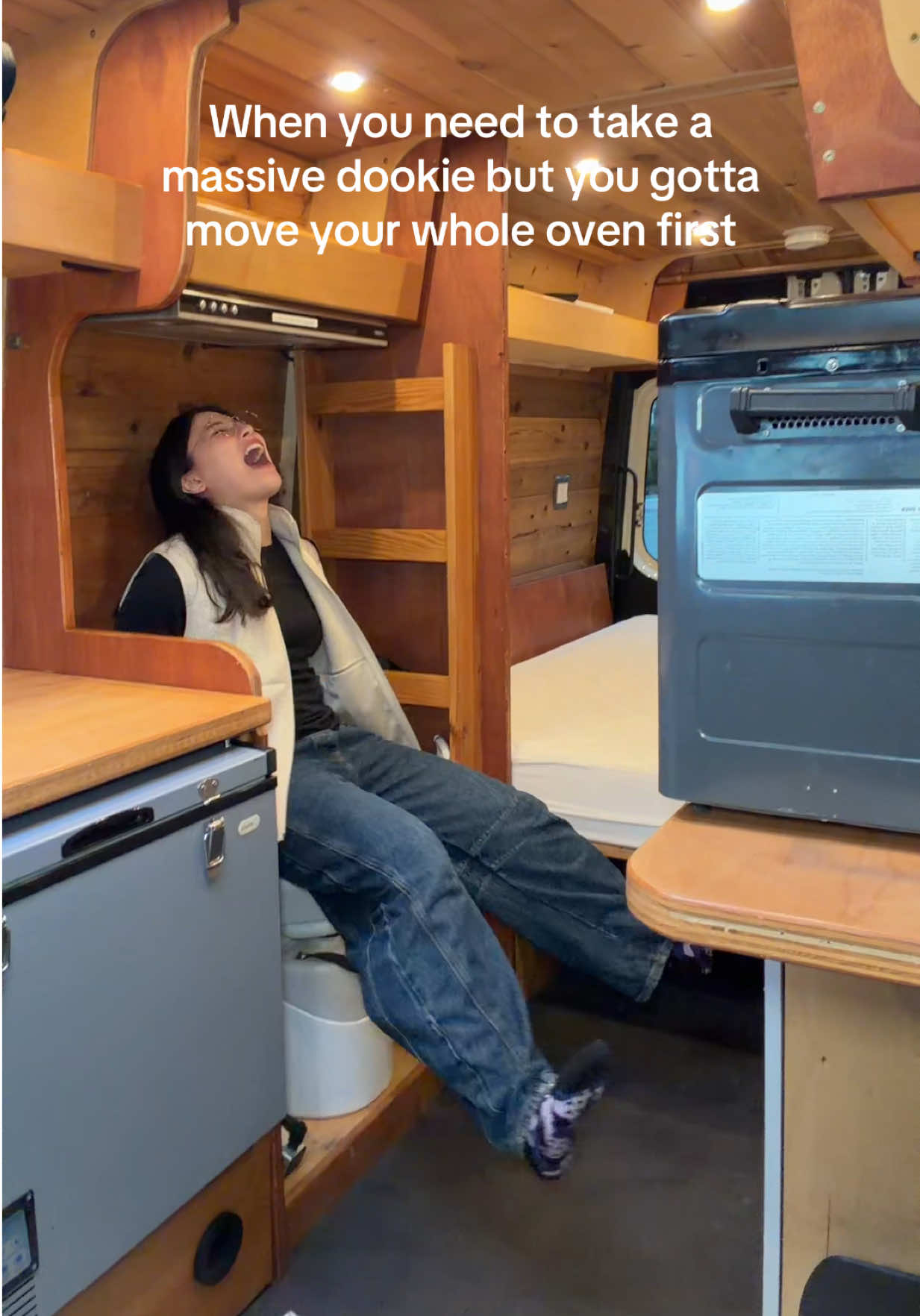 Relocating the heavy oven unit inside the camper van