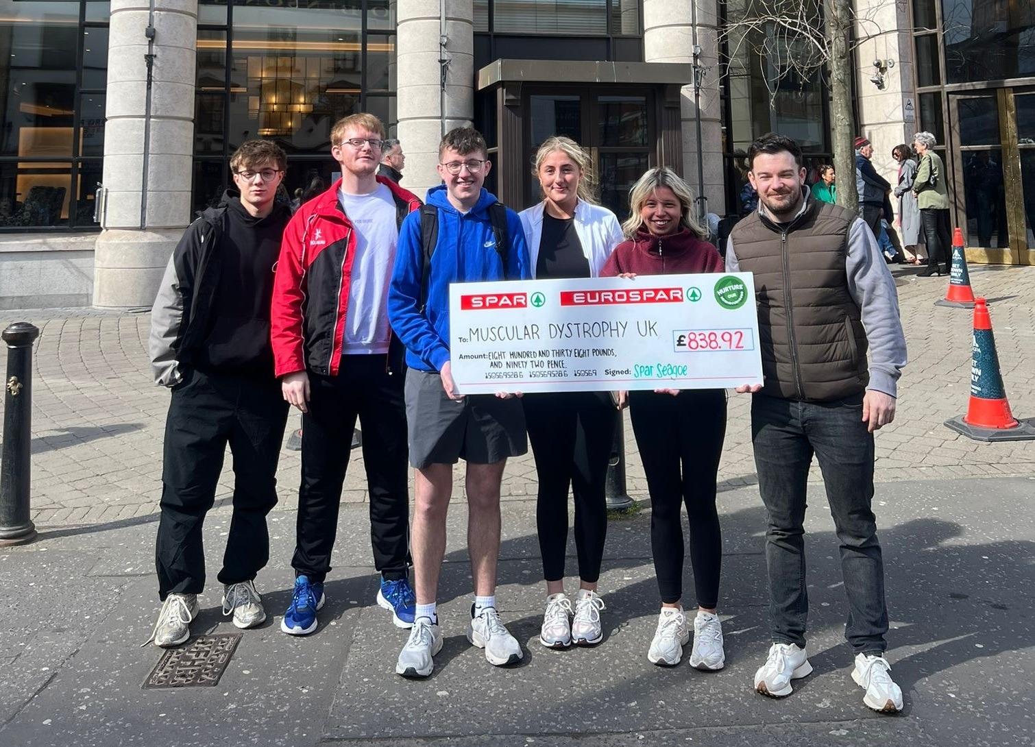 SPAR Seagoe team members take part in Europa Hotel charity abseil in ...