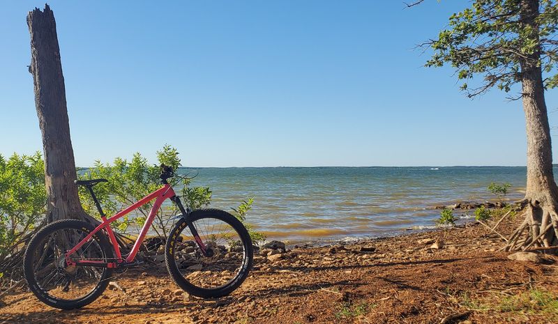 A Texas bike trail with rolling terrain and lakeside views that keeps ...