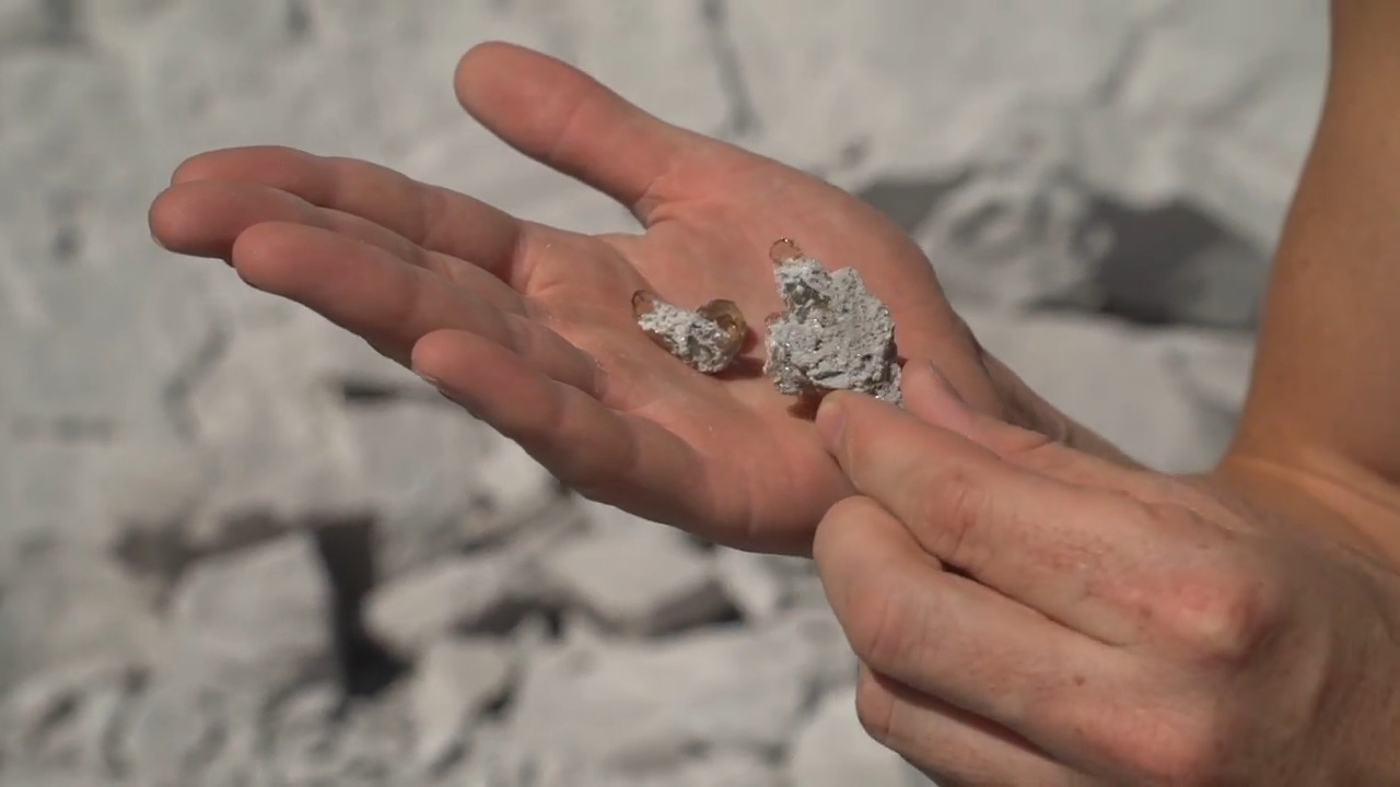 They blew open an ancient volcano - then found rare topaz crystals ...