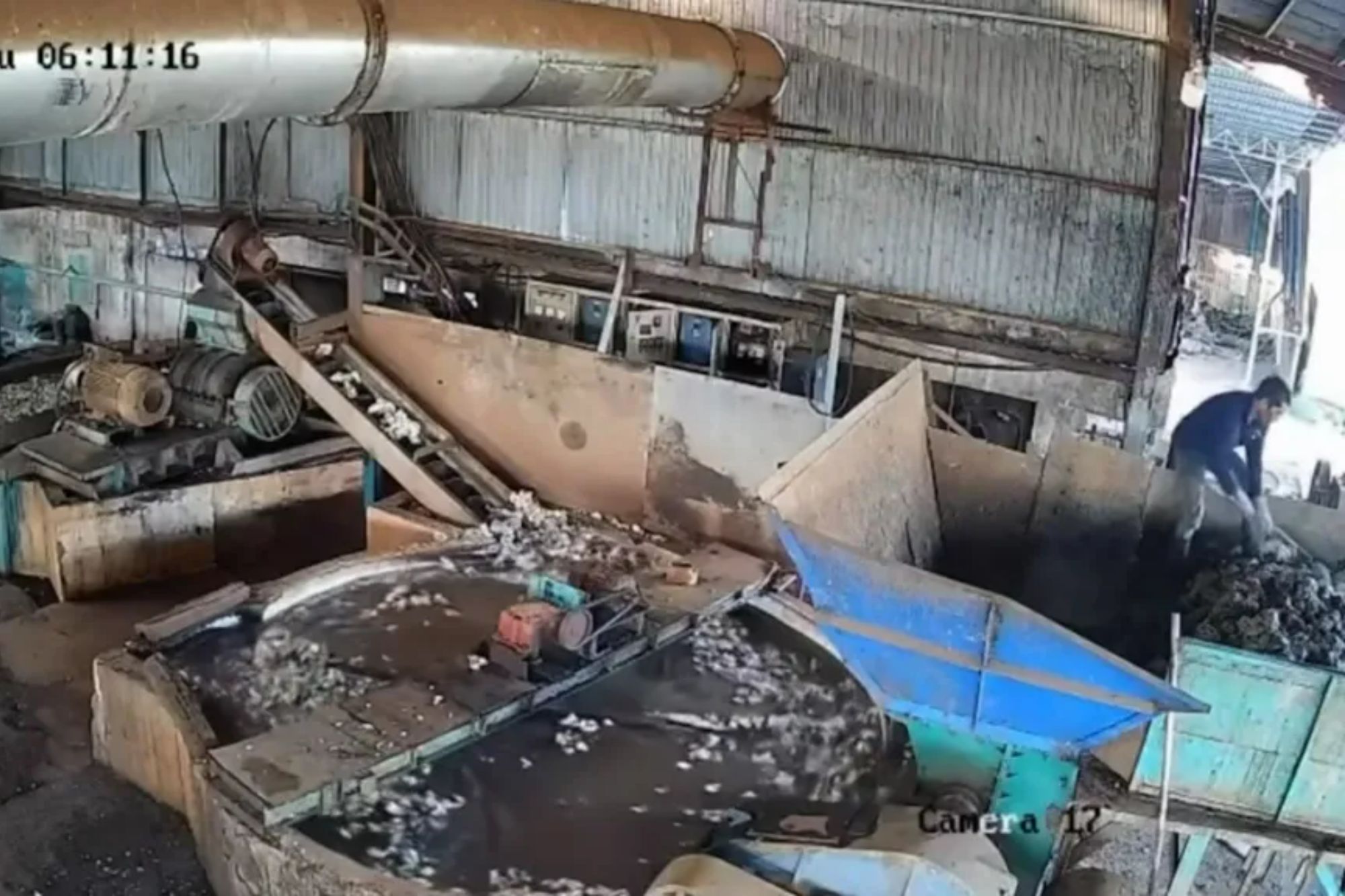 Horrific video shows factory worker being pulled to his death into ...