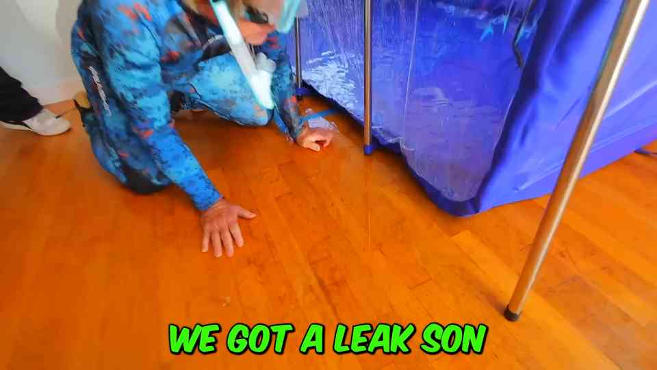 A hidden fish tank project nearly floods the house before the reveal