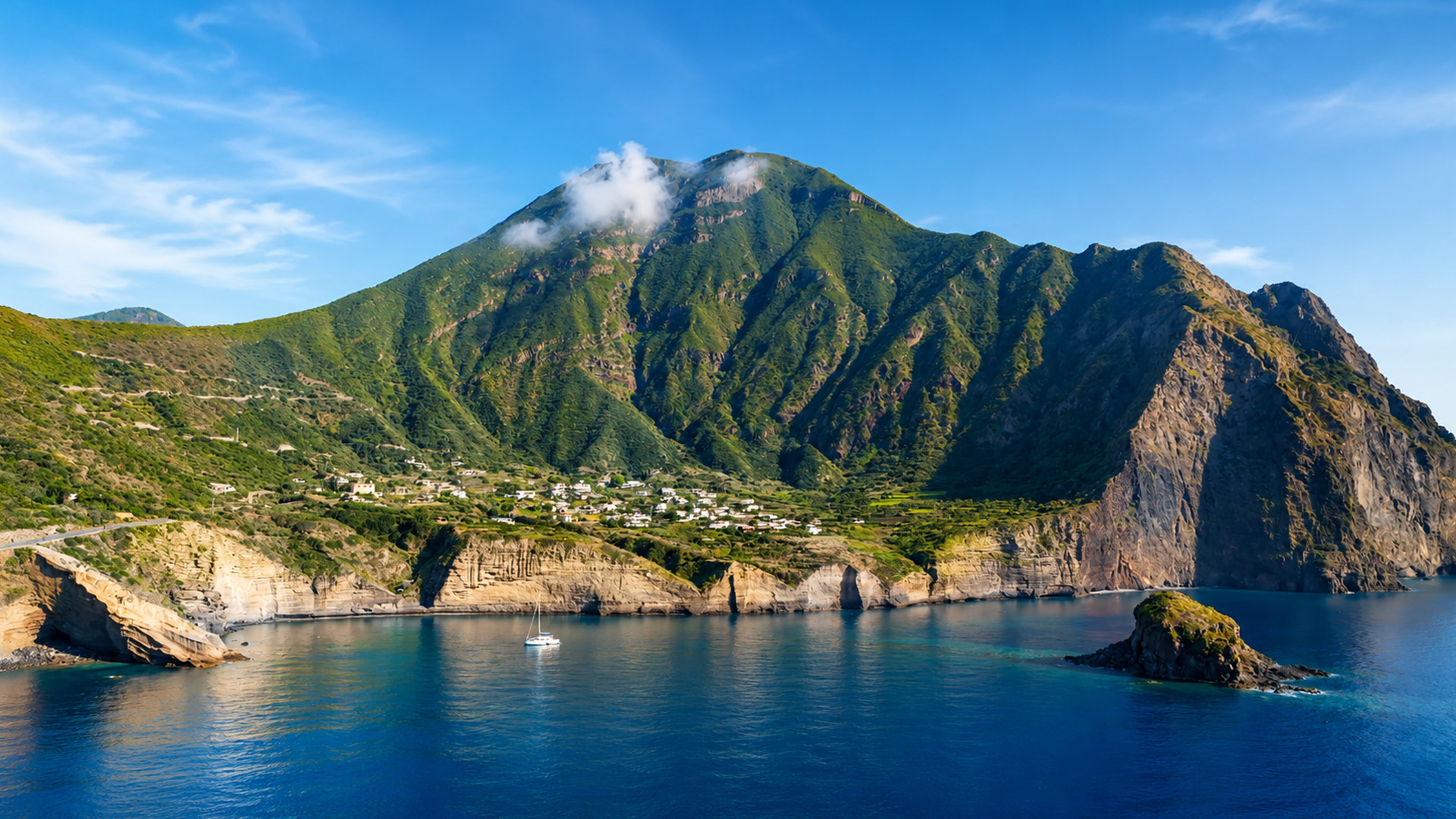 Why do people still live below this volcano?