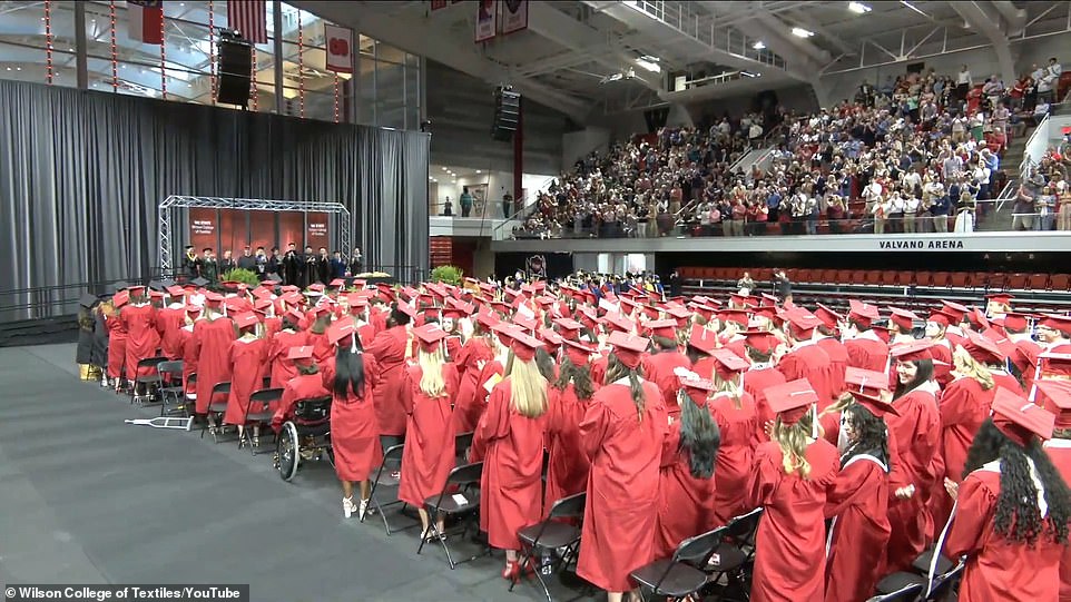 Grads find out senior year debts are canceled at graduation