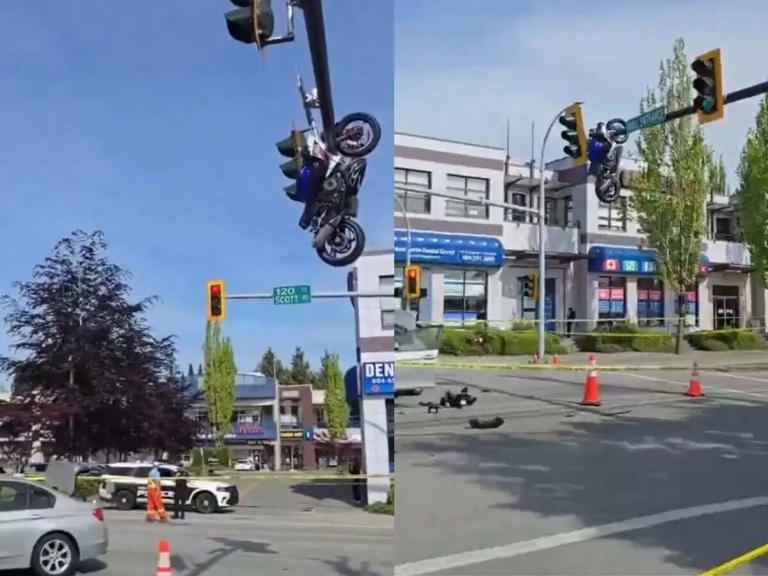 Viral video shows motorcycle left dangling from traffic light, hanging ...