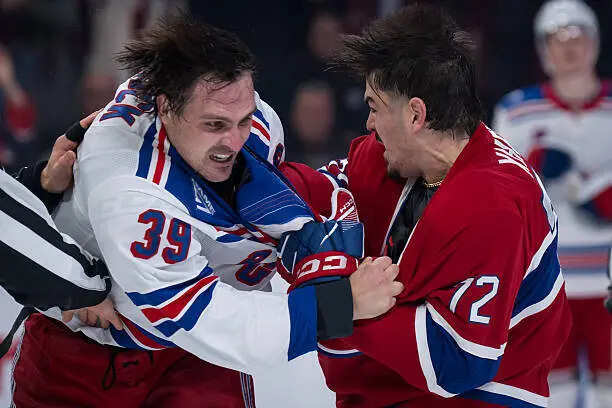 Montreal Canadiens defenseman Arber Xhekaj drops Buffalo Sabres forward ...