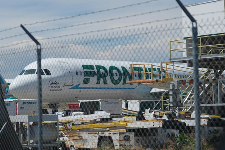 Frontier flight evacuated after gun magazine found on plane in Denver ...