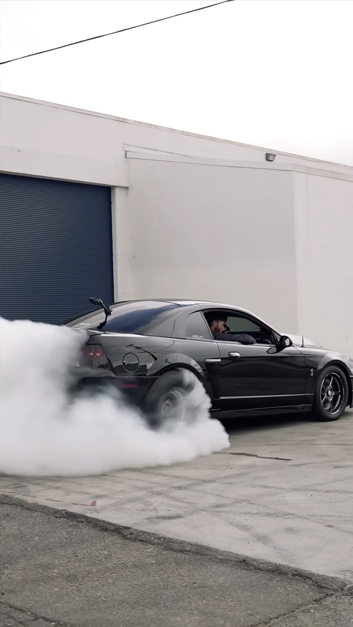 Custom modified Mustang burns out in the streets