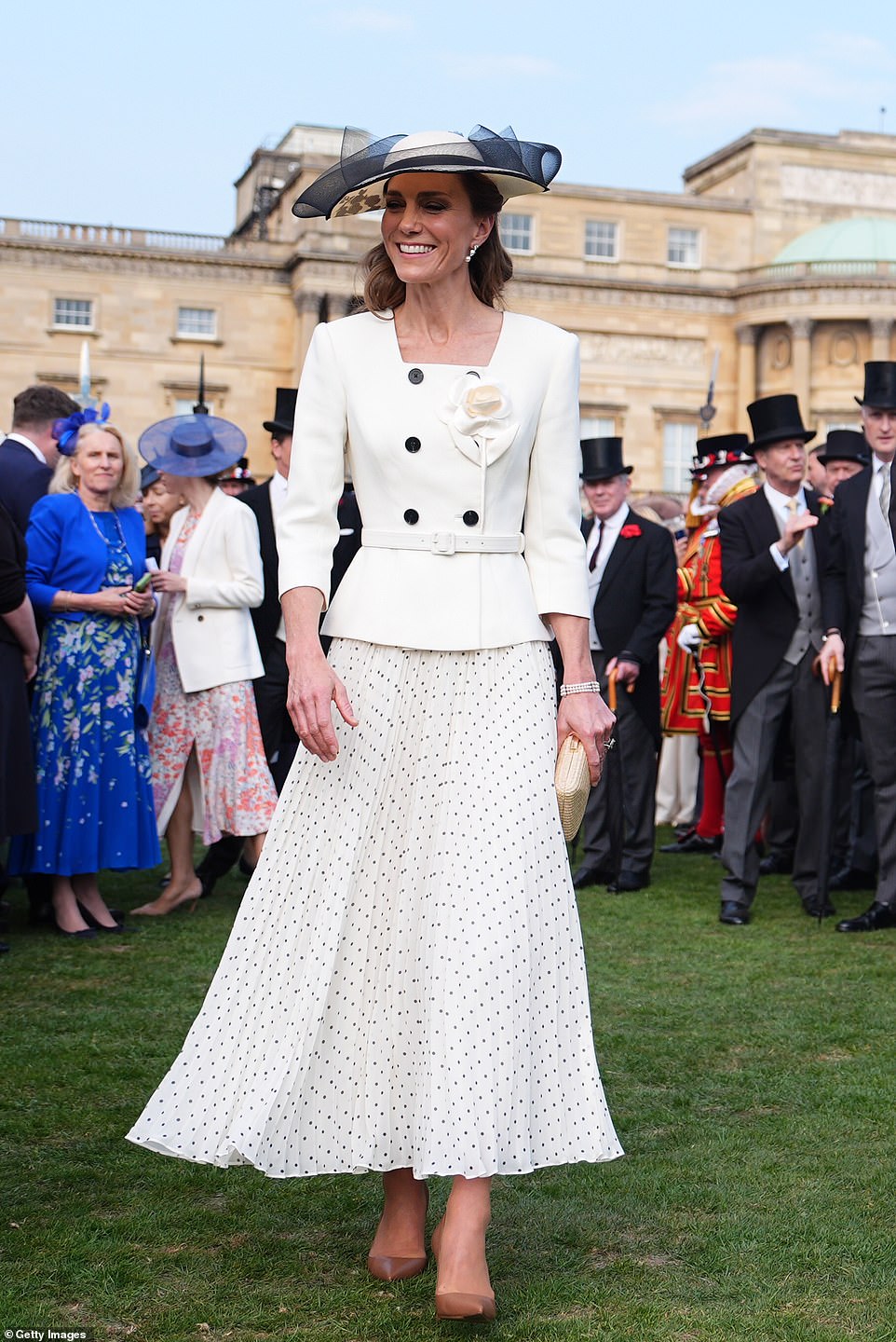 Kate impresses royal fans as she walks across the grass in stilettos