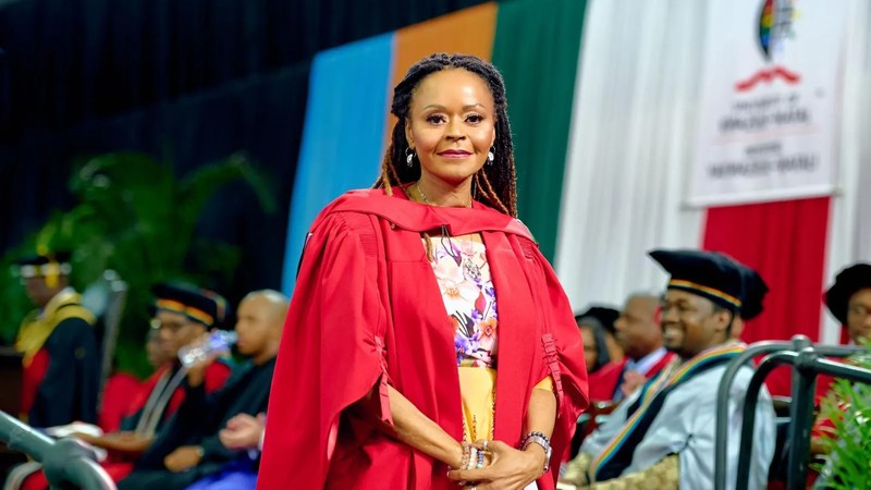 Graduation architect Dr Normah Zondo dons the red gown at UKZN graduation