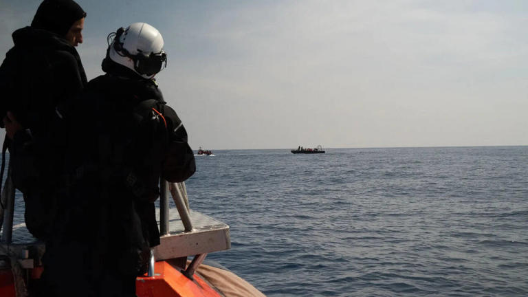 Libyan coast guard vessels open fire on migrant rescue ship in ...