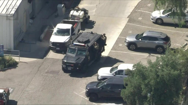 Six Flags Magic Mountain on lockdown as armored police trucks roll in