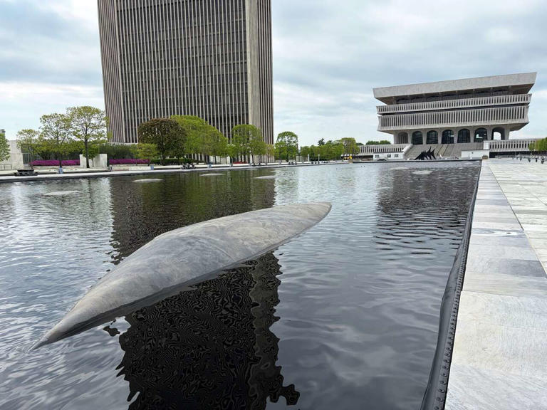 Giant air bubbles surface at Empire State Plaza reflecting pools