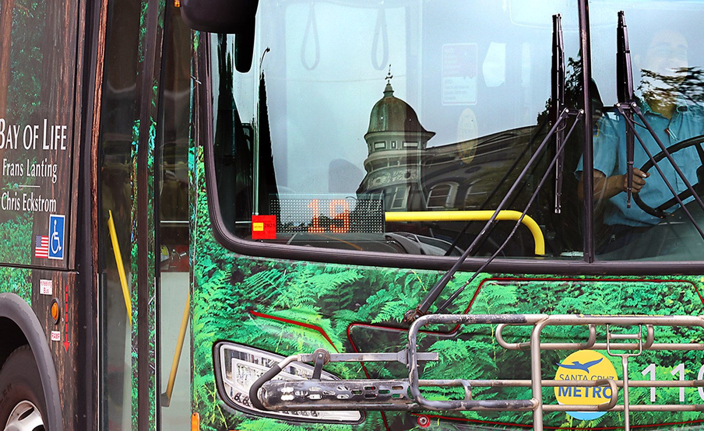 Photo | Leonard Building in downtown Santa Cruz reflected on Metro bus