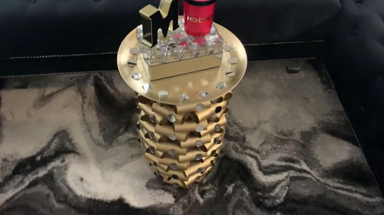 Turn a pile of toilet paper rolls into a stylish side table with hidden ...