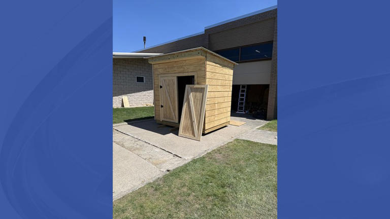 Fitch students build sheds for playground