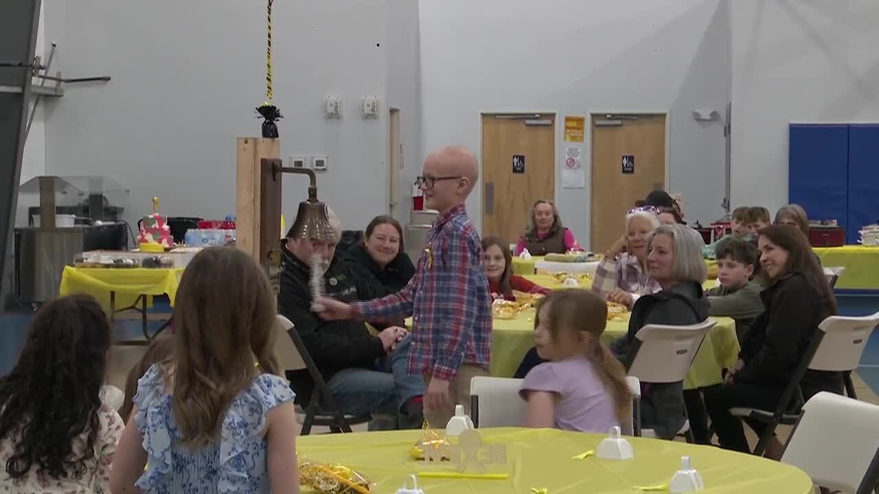 12-year-old boy rings cancer bell after making Easter baskets for sick kids