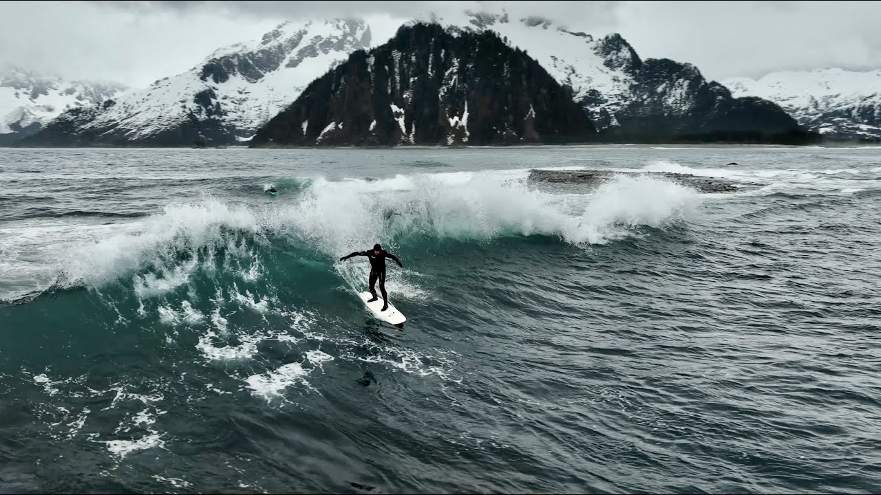 Surfing a remote island in Alaska