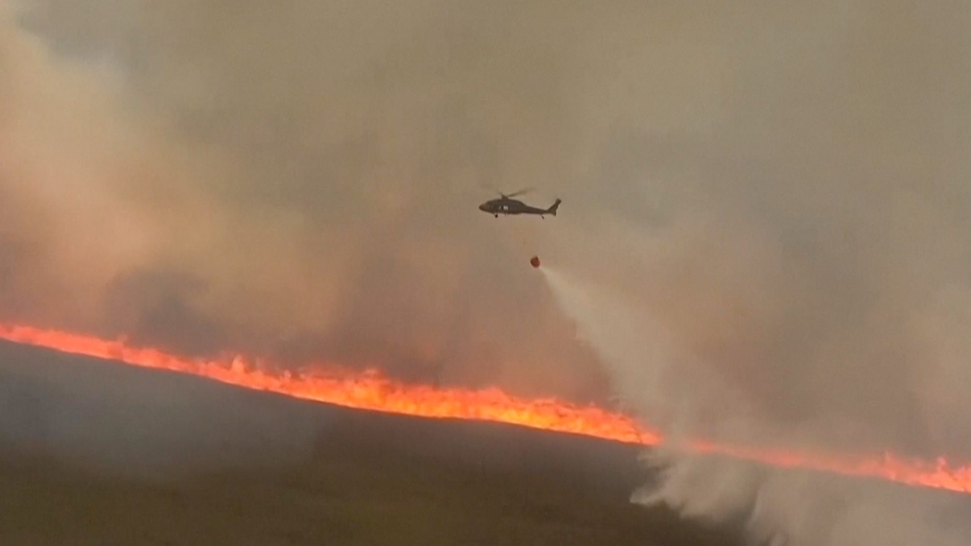 Firefighters battle to contain Florida Everglades brush fire