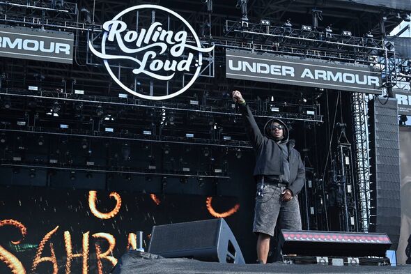 Rolling Loud attendee falls after being struck by flying trash can ...