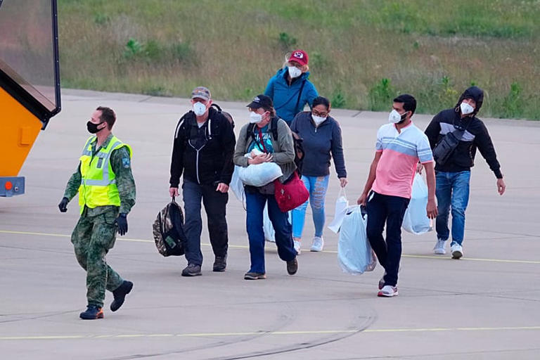 12 hospital workers quarantined after faulty procedure treating ...