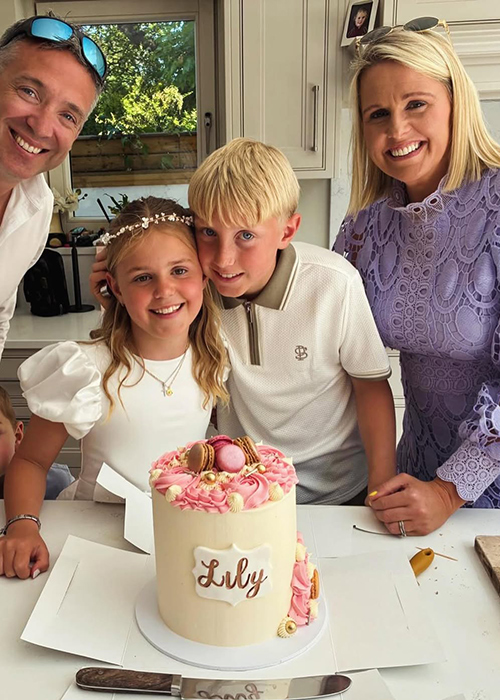 Jacqui Hurley dusts off pretty purple dress for daughter's communion