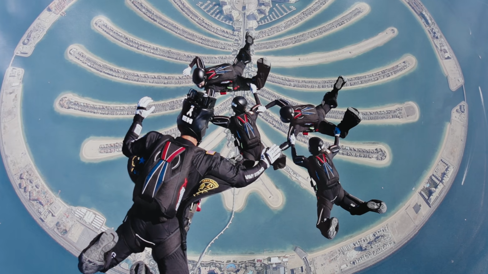 Watch soldiers fall from 10,000 feet toward 70,000 screaming people ...