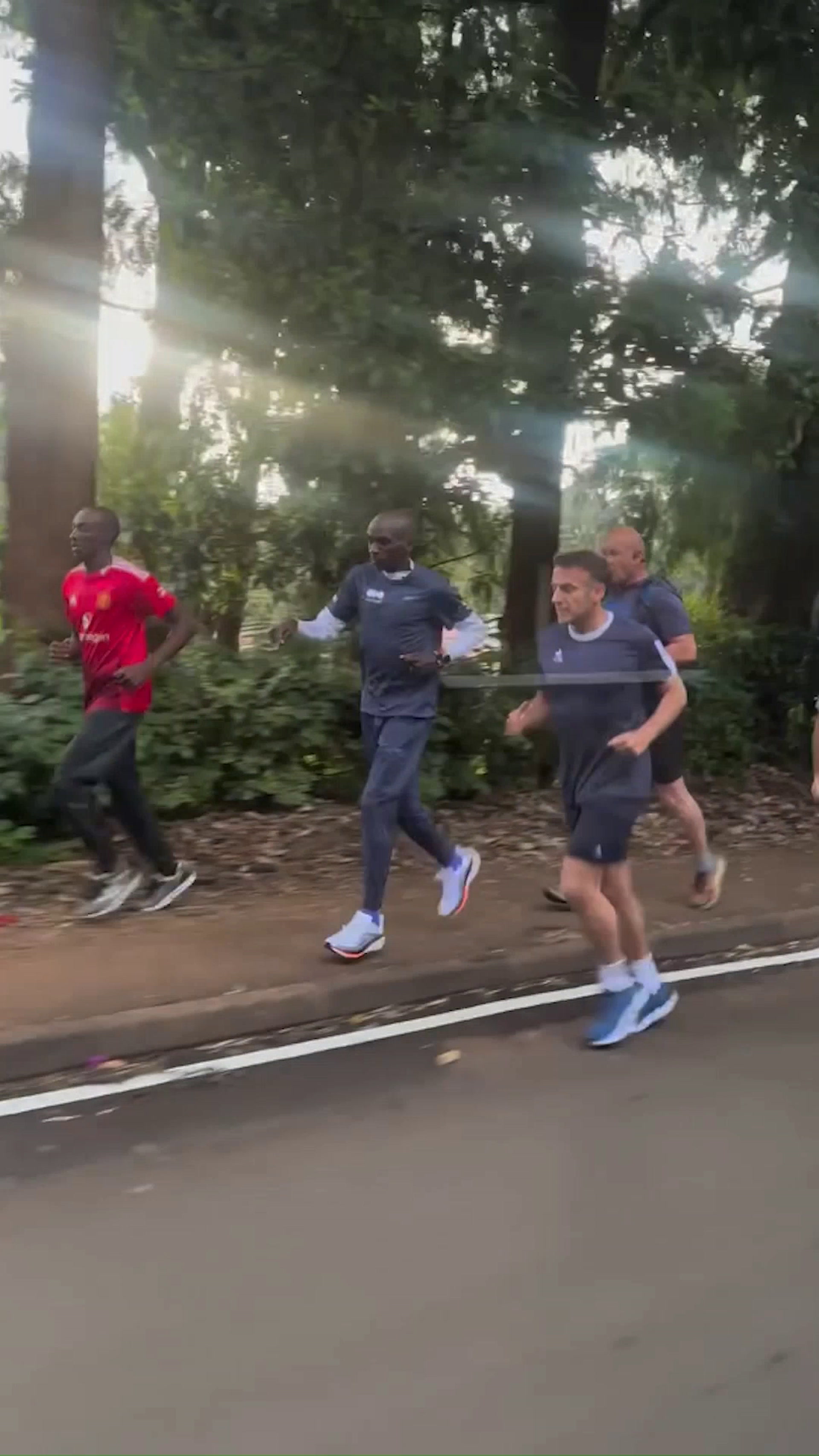 Macron joins Olympic marathon champion for morning run